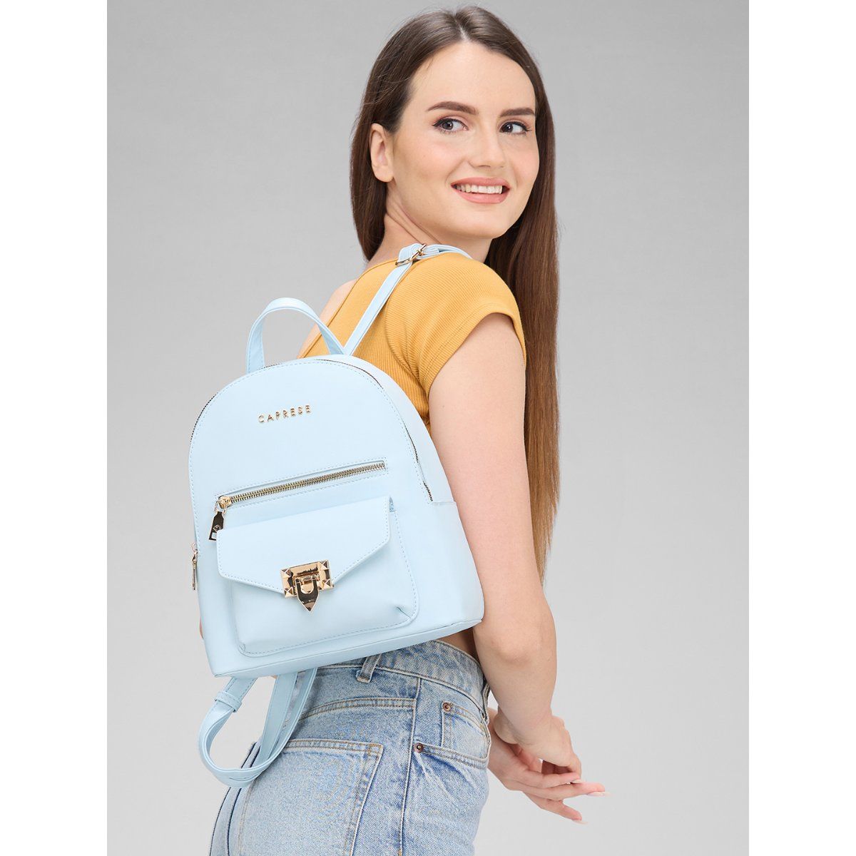 Buy Caprese Womens Rabina Fashion Medium Blue Solid Backpack Online