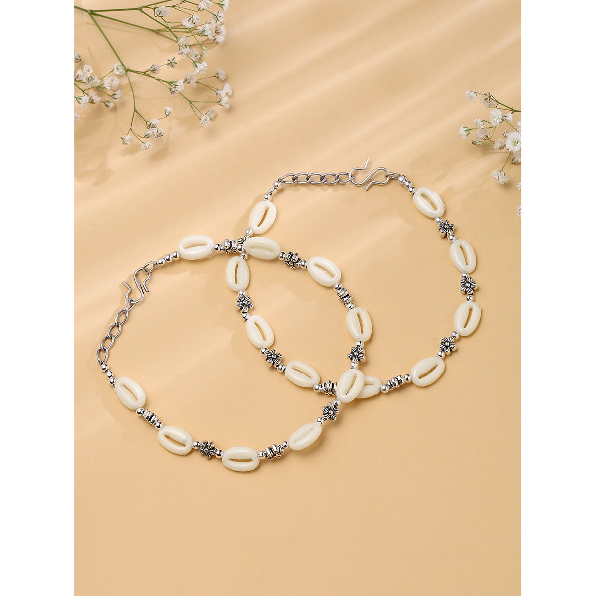 Buy VIRAASI Silver Plated Sea Shell Anklets Pair Online