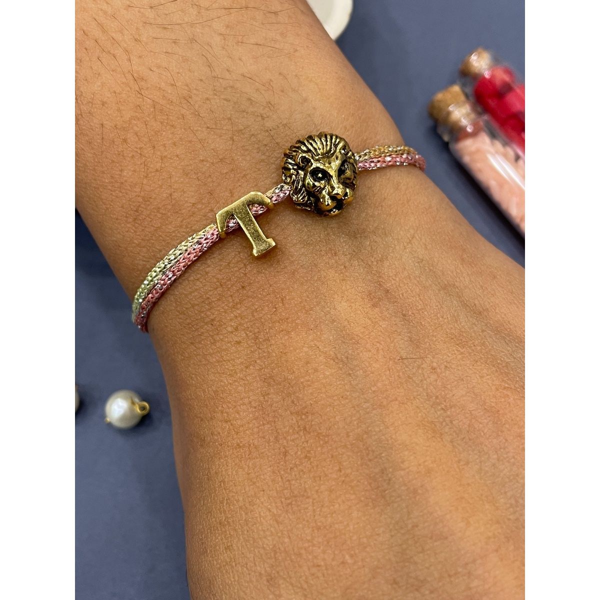 Buy Digital Dress Room Letter T Lion Charm Thread Rakhi Online