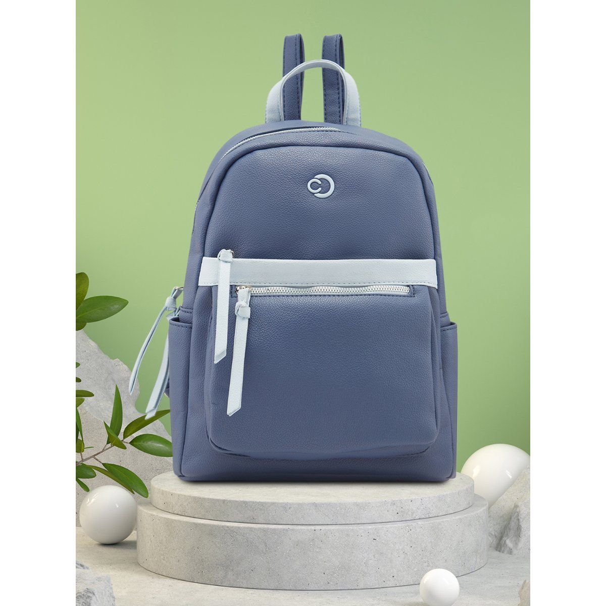 Buy Caprese Blue Solid Backpack Online