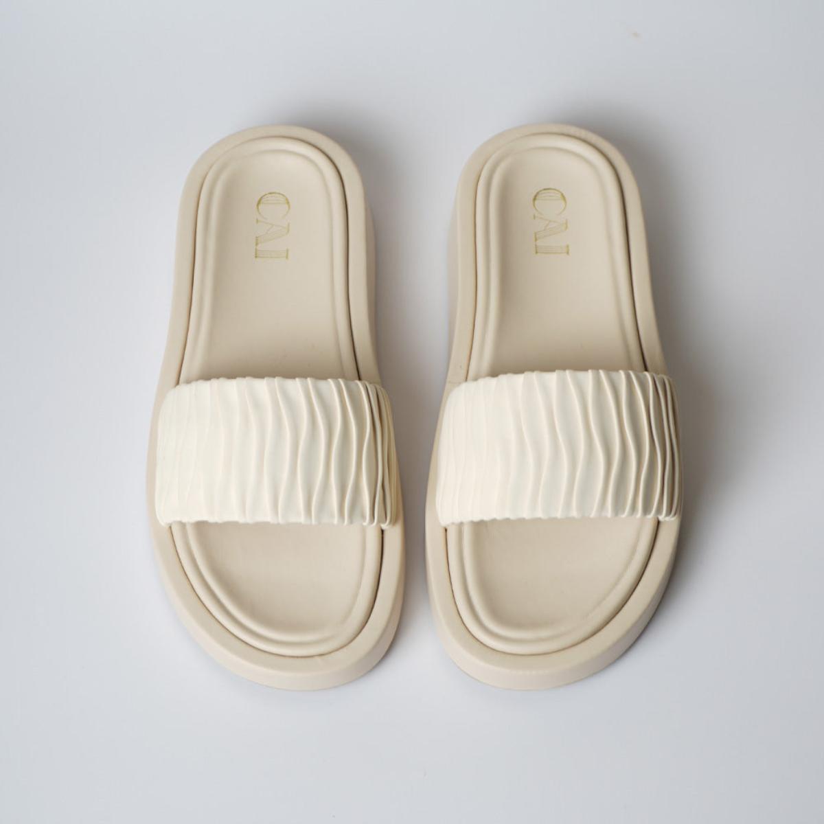 Buy THE CAI STORE Wavy Cream Sliders Online