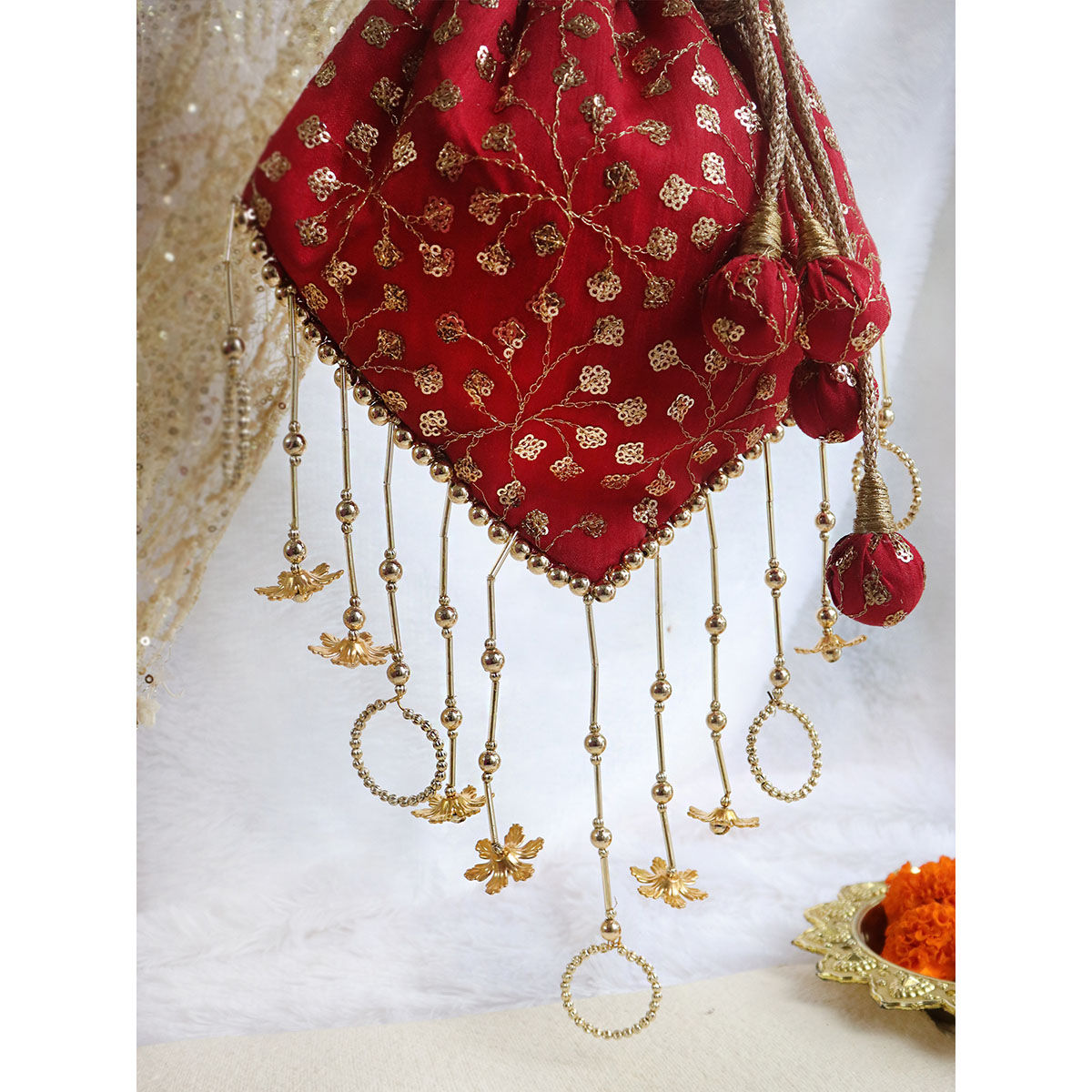 Buy Soho Boho Studio Maroon Embellished Tassles Triangle Potli Bag Online