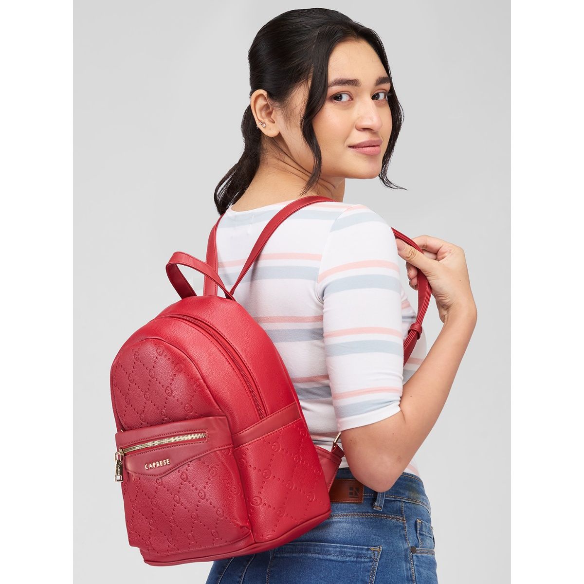 Buy Caprese Red Solid Backpack Online