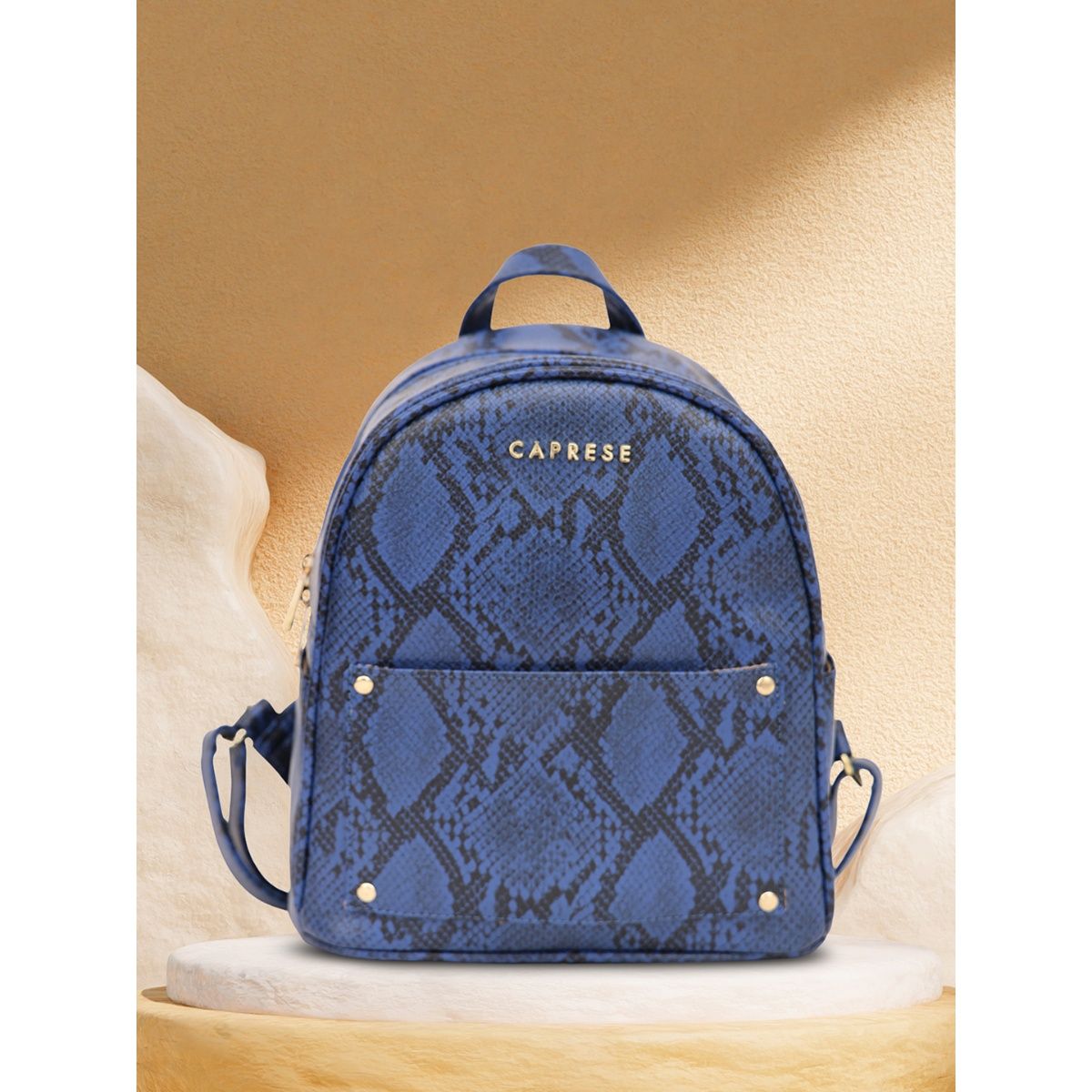 Buy Caprese Blue Animal Print Backpack Online
