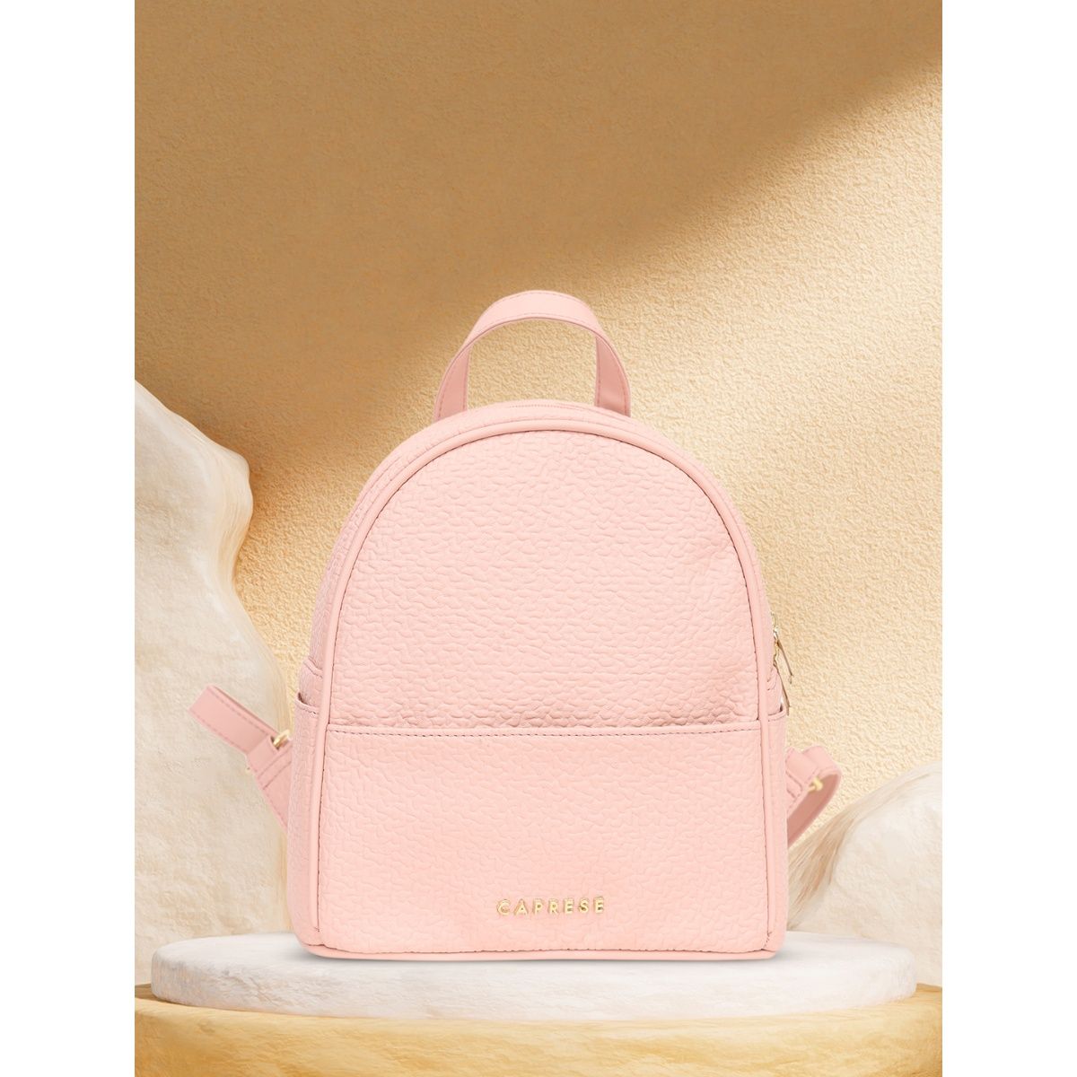 Buy Caprese Pink Solid Backpack Online