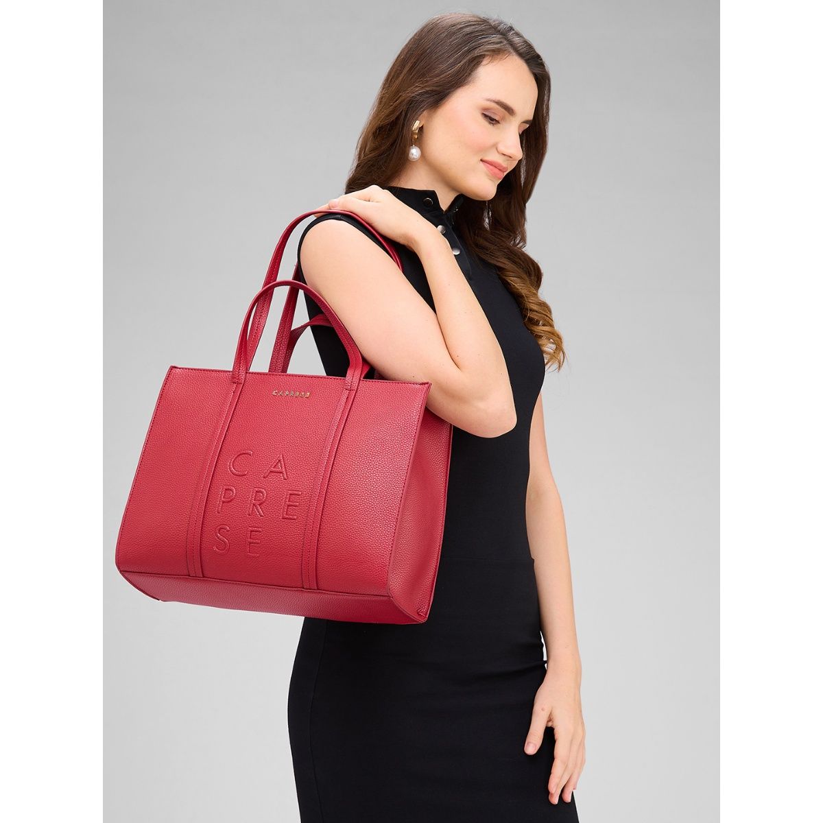 Buy Caprese Red Solid Hand Bag Online