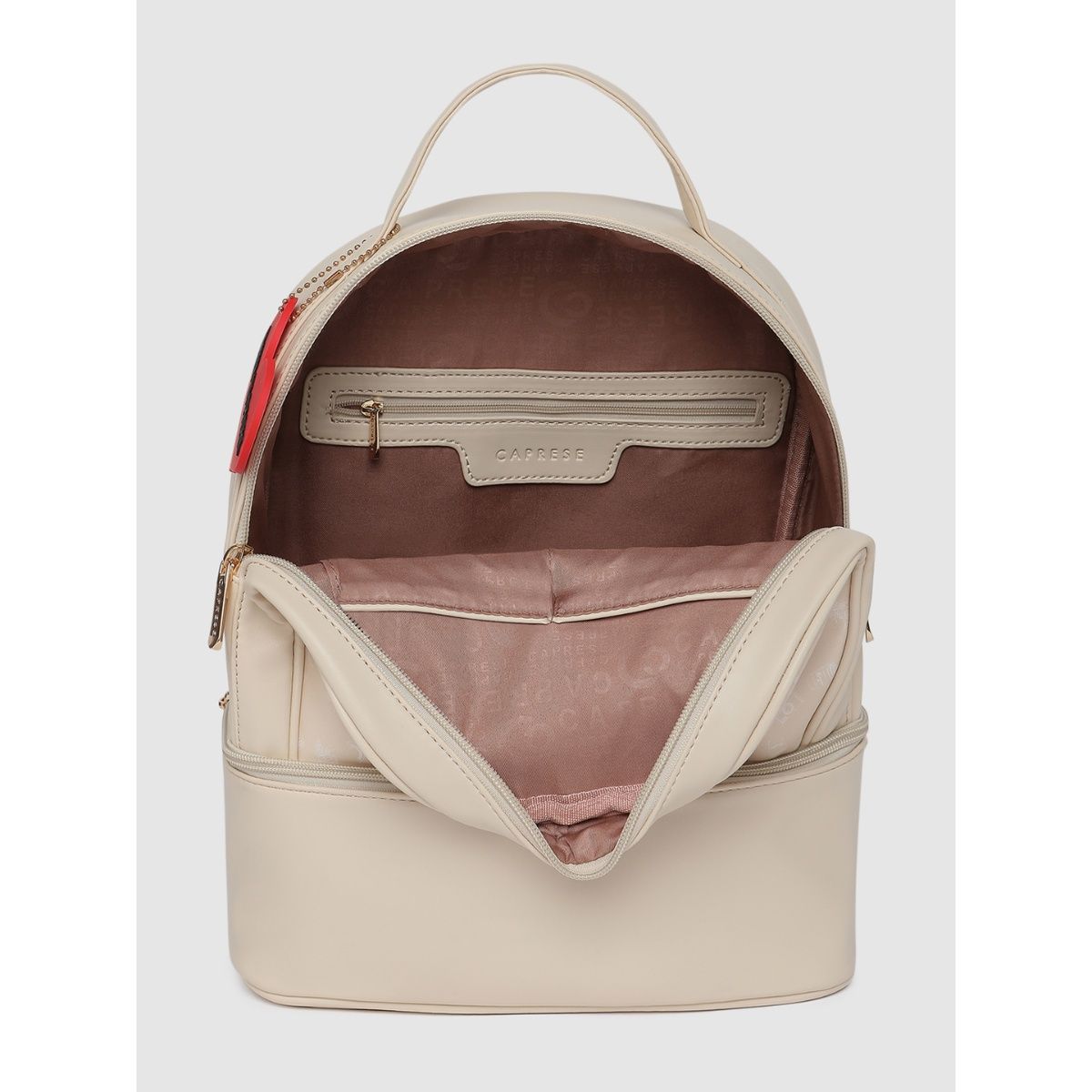 Buy Caprese Emily in Paris Printed Off White Backpack Bag Online