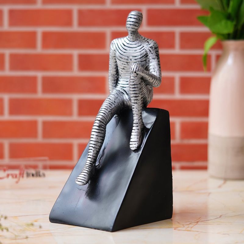 Buy eCraftIndia Silver Man Statue Sitting on Triangle Black Base Human ...