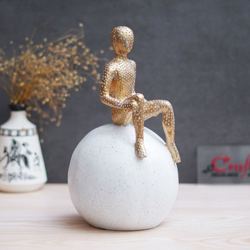 Buy eCraftIndia Golden Boy Statue Sitting on White Ball Human Figurine ...