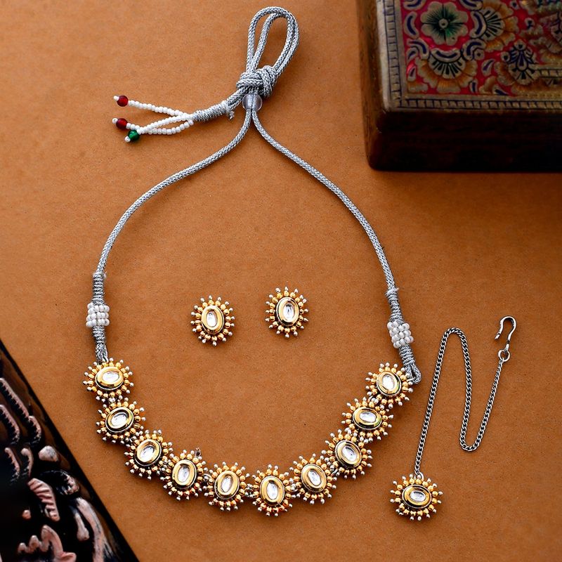 Buy Voylla Veerangana White Pearls and Oval Cut Kundan Maang Tika Set ...