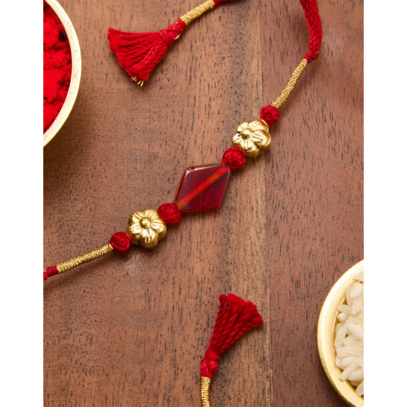 Buy Fabindia Red Thread Rakhi with Roli Chawal Online