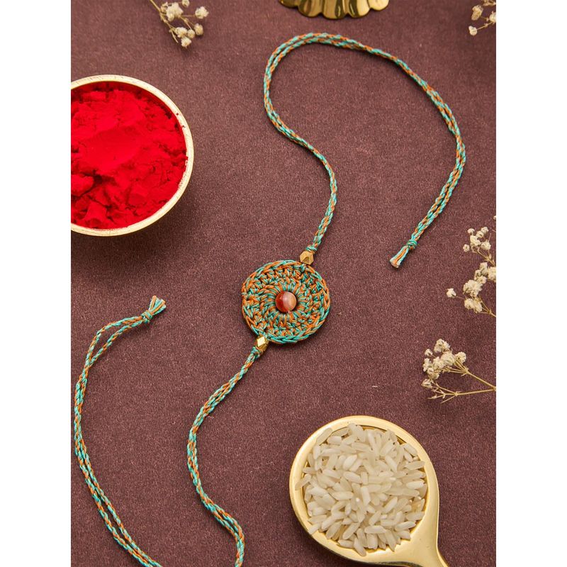 Buy Fabindia Women Multi Solid Rakhi with Roli and Chawal Online