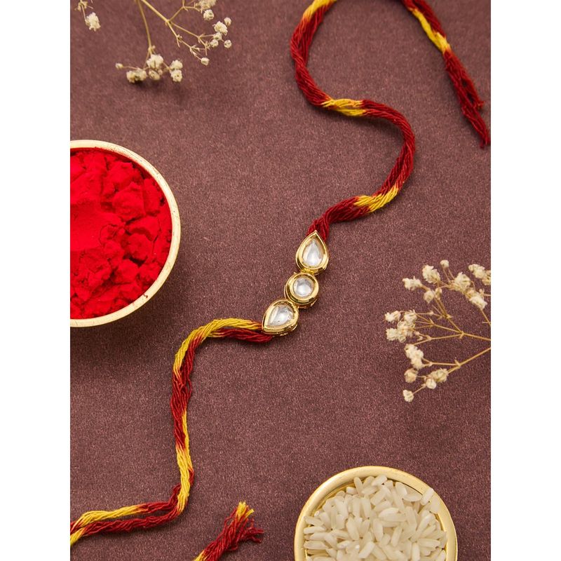 Buy Fabindia Women White Solid Rakhi with Roli and Chawal Online