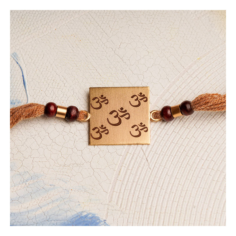 Suhani Pittie Square Laser Om Rakhi with Chandan Beads (22k Gold Plated ...
