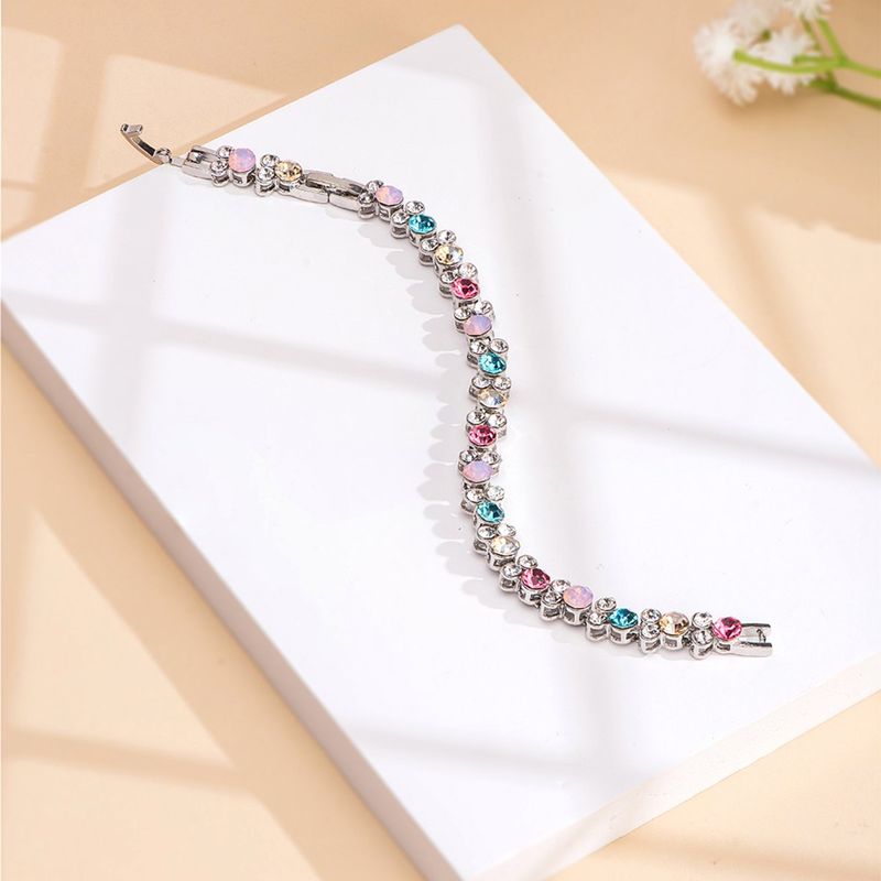 Buy Yellow Chimes Silver Tone Multi-Color Crystal Studded Bracelet Online