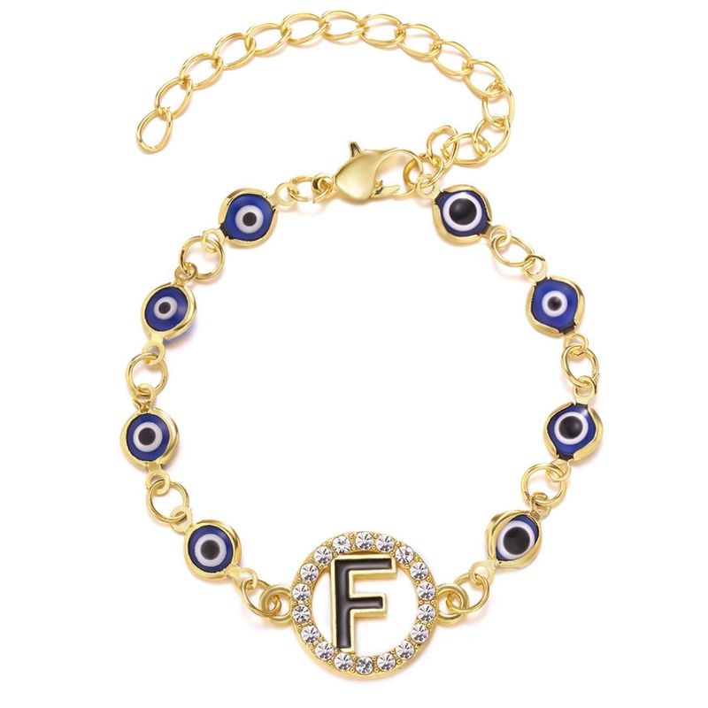 FEMNMAS Letter F Evil Eye Charm: Buy FEMNMAS Letter F Evil Eye Charm ...
