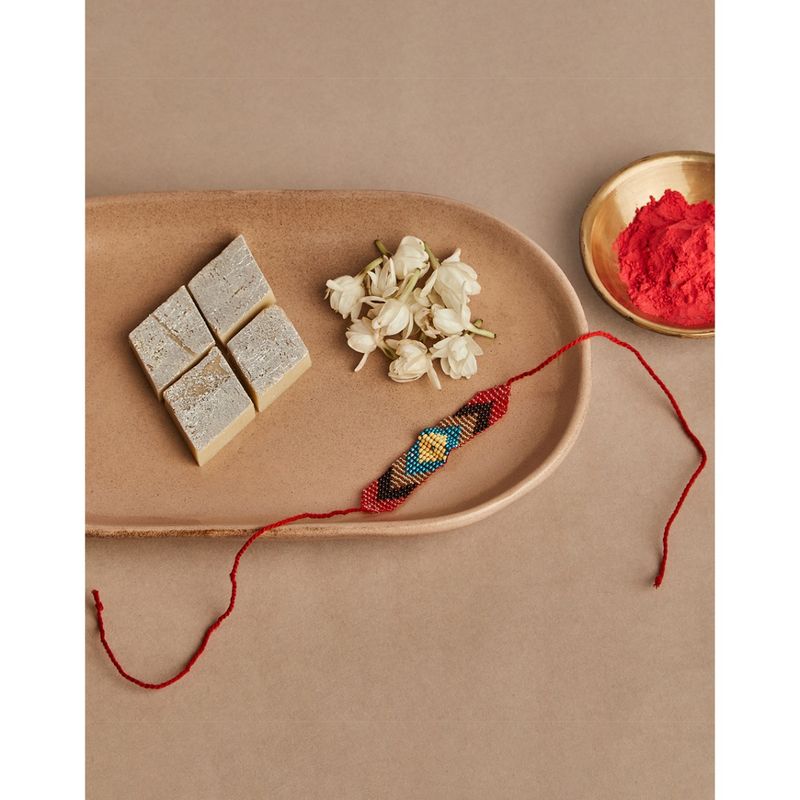 Buy Fabindia Red Handcrafted Thread Rakhi Online