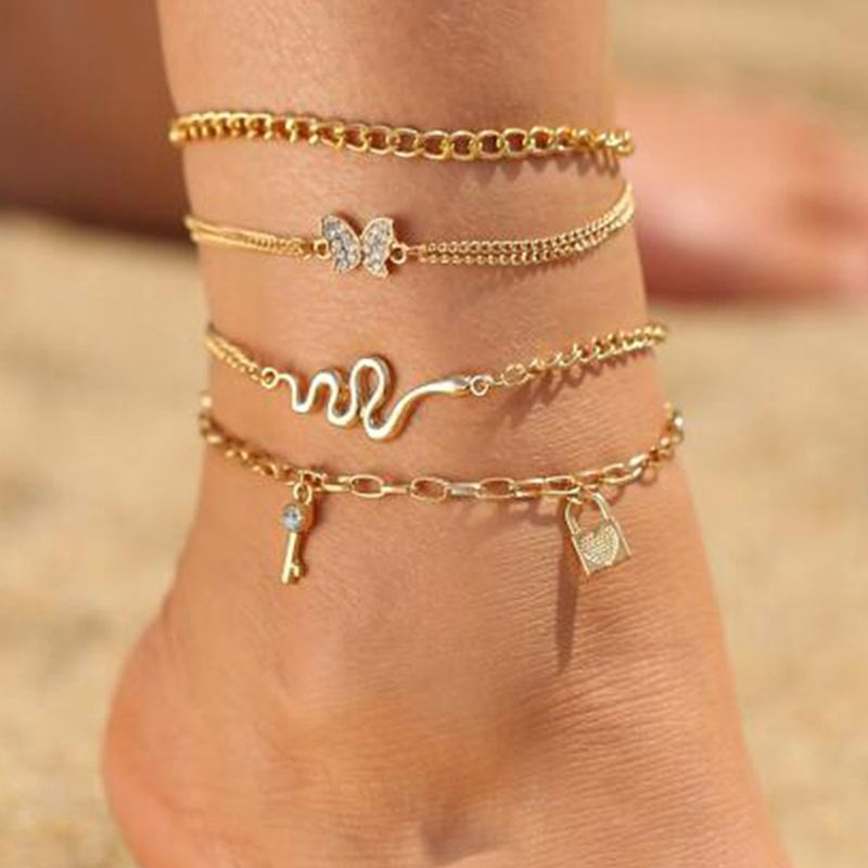 Buy Yellow Chimes Gold Tone Multilayered Chain with Butterfly Snake ...