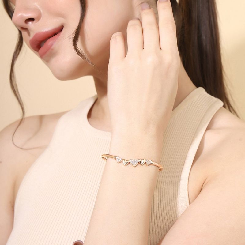 Buy PRITA Gold Plated Sequence Heart Bracelet Online