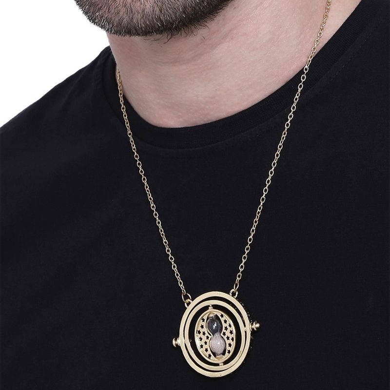 Yellow Chimes Gold-Plated Time Turner Locket Pendant With Chain: Buy ...