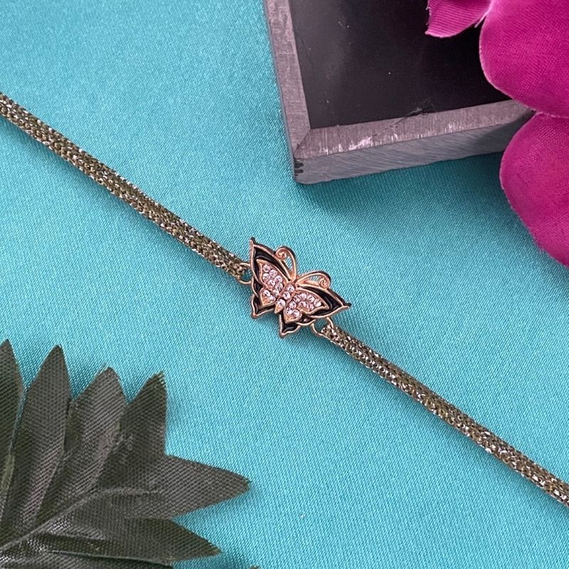 Buy Digital Dress Room Gold Plated Ad Black Butterfly Charm Rakhi For ...