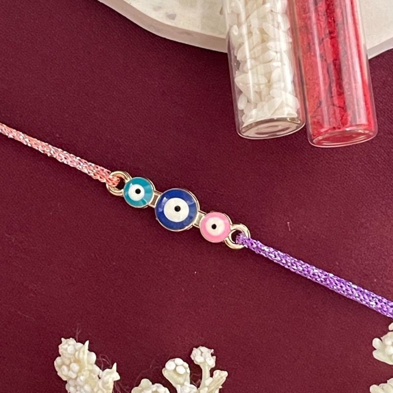 Buy Digital Dress Room Gold Plated Multicolor Evil Eye Charm Rakhi For ...