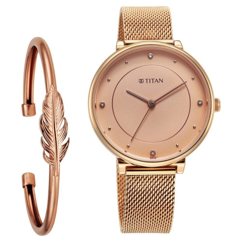 Buy Titan Purple Stackable Quartz Analog Peach Dial Watch for Women ...
