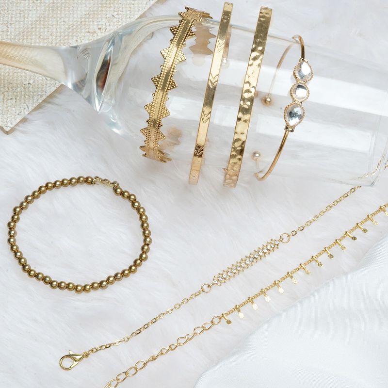 Buy Joker & Witch Gold Blaze Set Of 7 Bracelets For Women Online