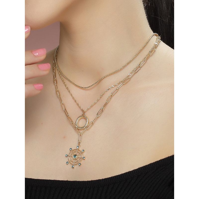 Buy Karatcart Gold Plated Blue Ship Handle Charm Multilayered Chain ...