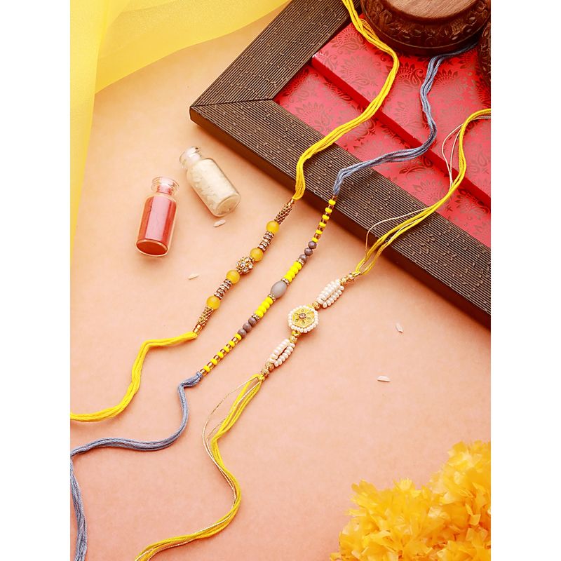 Buy Aatmana Faux Pearls Embellished Thread Rakhi with Roli Chawal Online