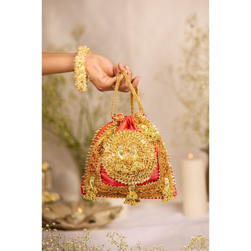 Buy 5 Elements by Radhika Gupta Mayra Orange Potli Online